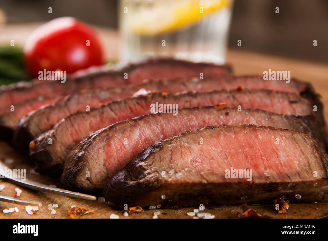 cooked beef steak sliced medium rare close-up Stock Photo - Alamy