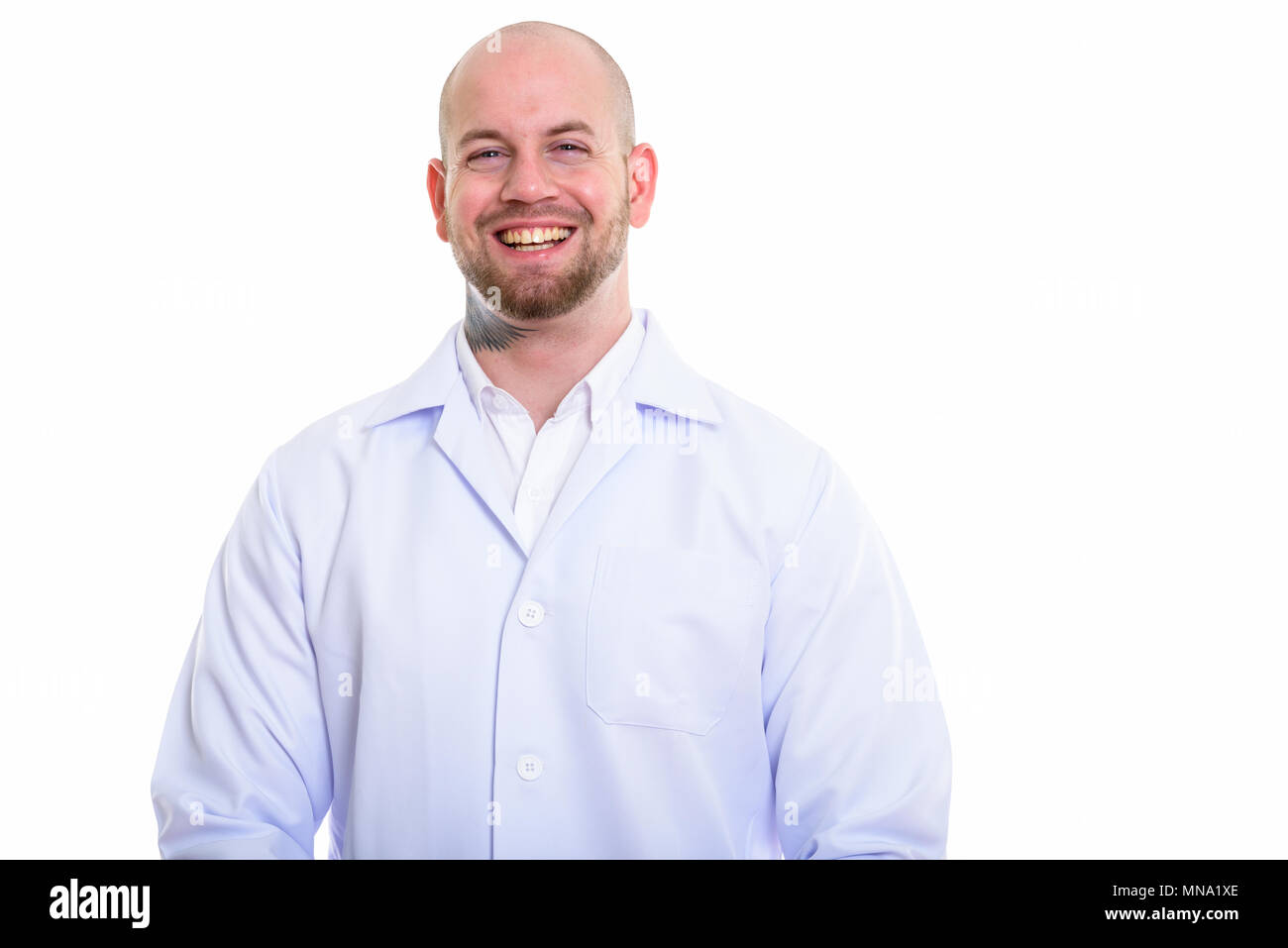 Studio shot of young bald muscular man doctor Stock Photo - Alamy
