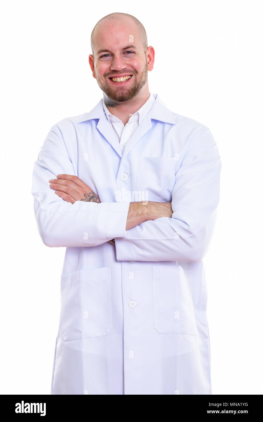Studio shot of young bald muscular man doctor Stock Photo - Alamy