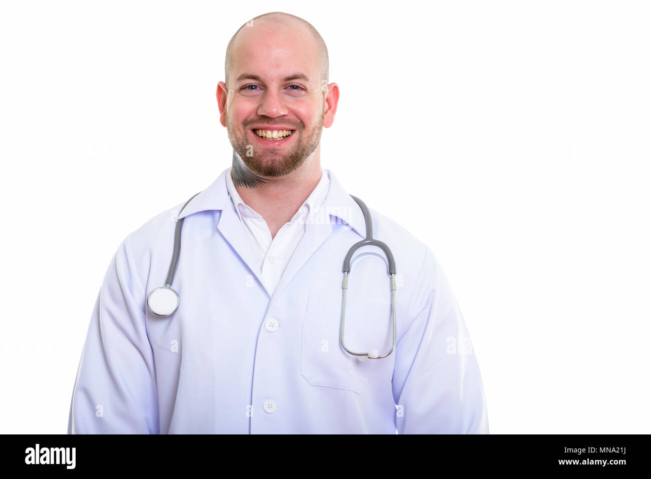 Studio shot of young bald muscular man doctor Stock Photo - Alamy