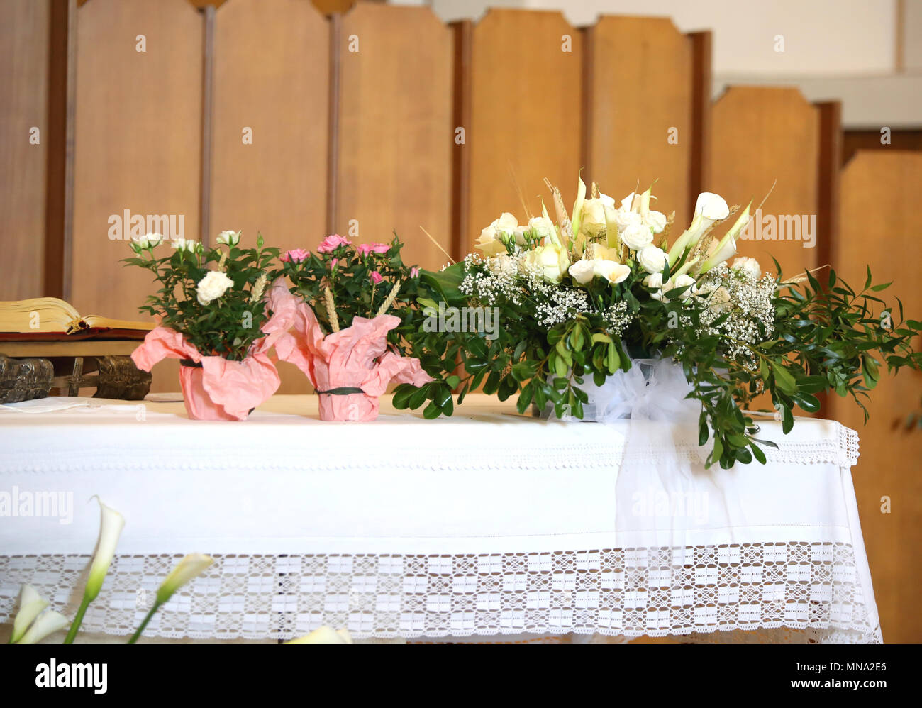 white and pink flowers and on the holy altar in the Basilica Stock ...