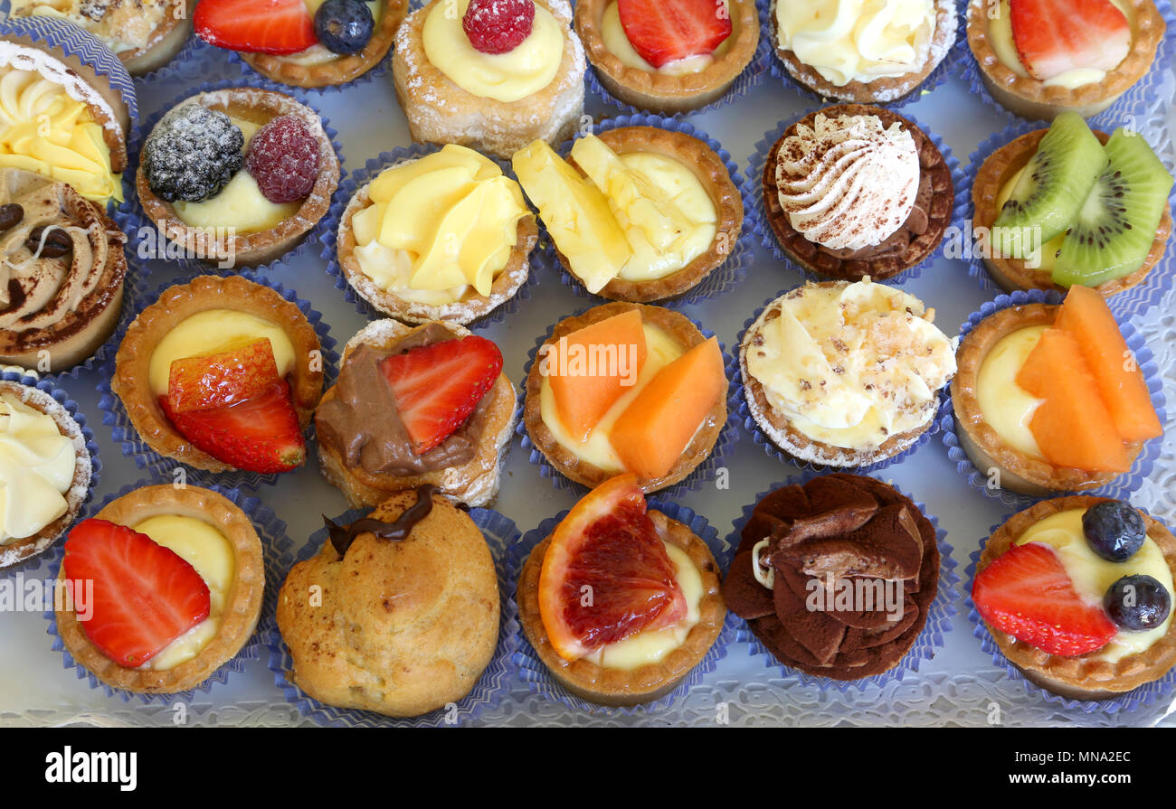 Many pastries in the candy store Stock Photo - Alamy