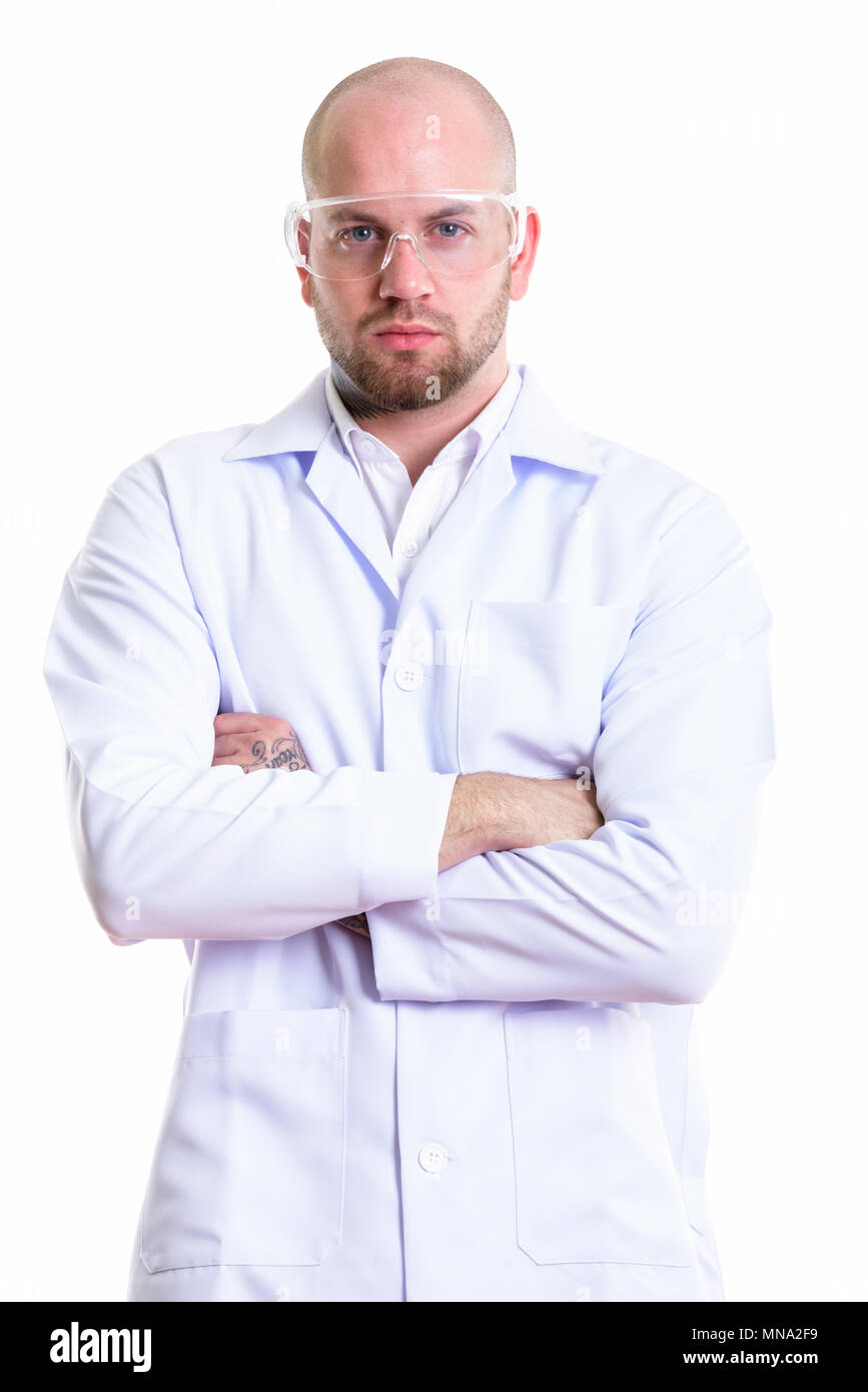 Studio shot of young bald muscular man doctor Stock Photo - Alamy