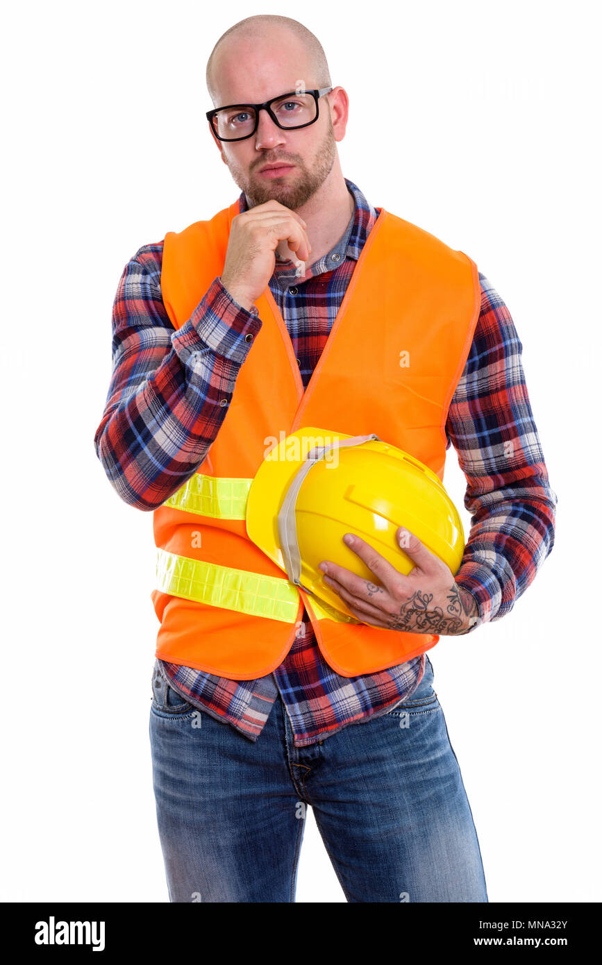 Young bald muscular man construction worker Stock Photo - Alamy