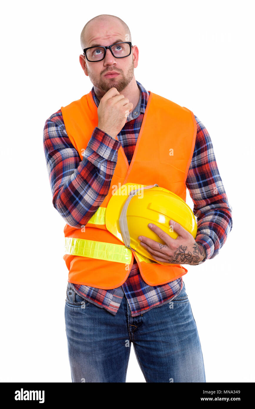 Young bald muscular man construction worker Stock Photo - Alamy