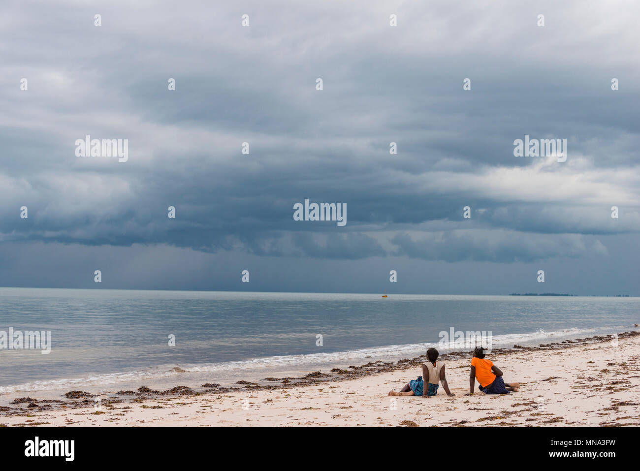People seen on a beach in Inhassoro Mozambique Stock Photo - Alamy