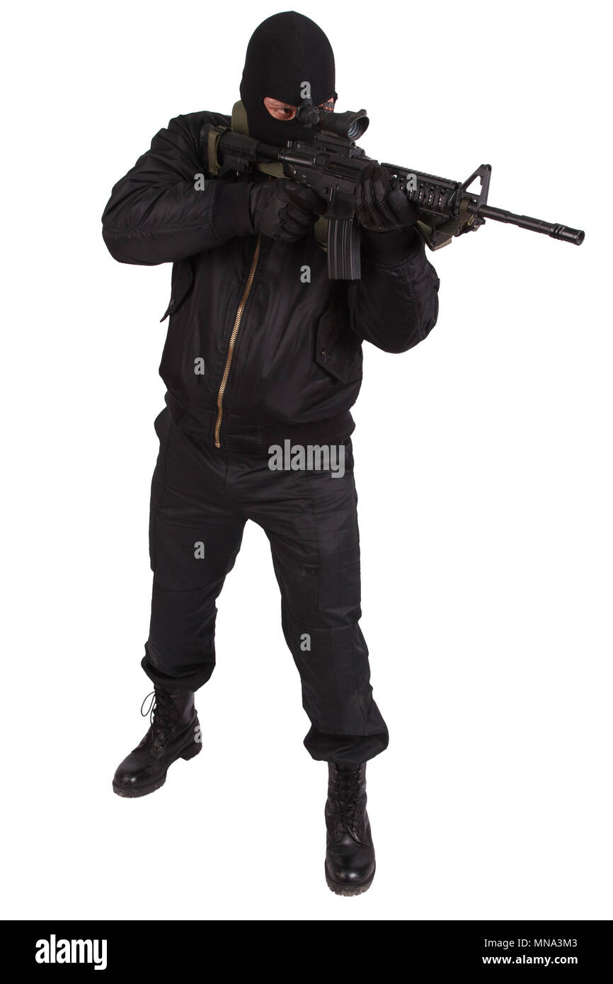 robber in black uniform and mask with m4 rifle isolated Stock Photo - Alamy