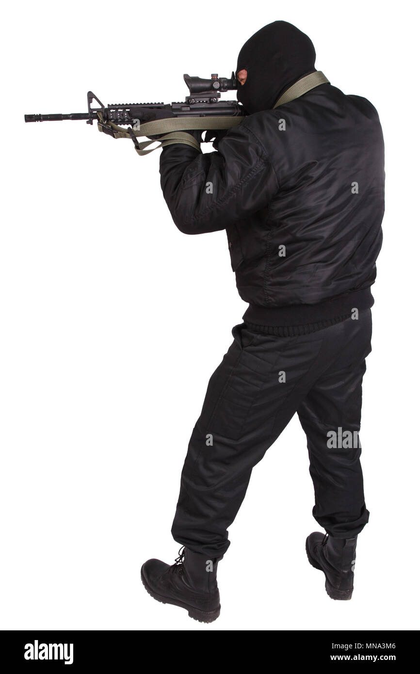 robber in black uniform and mask with m4 rifle isolated Stock Photo - Alamy