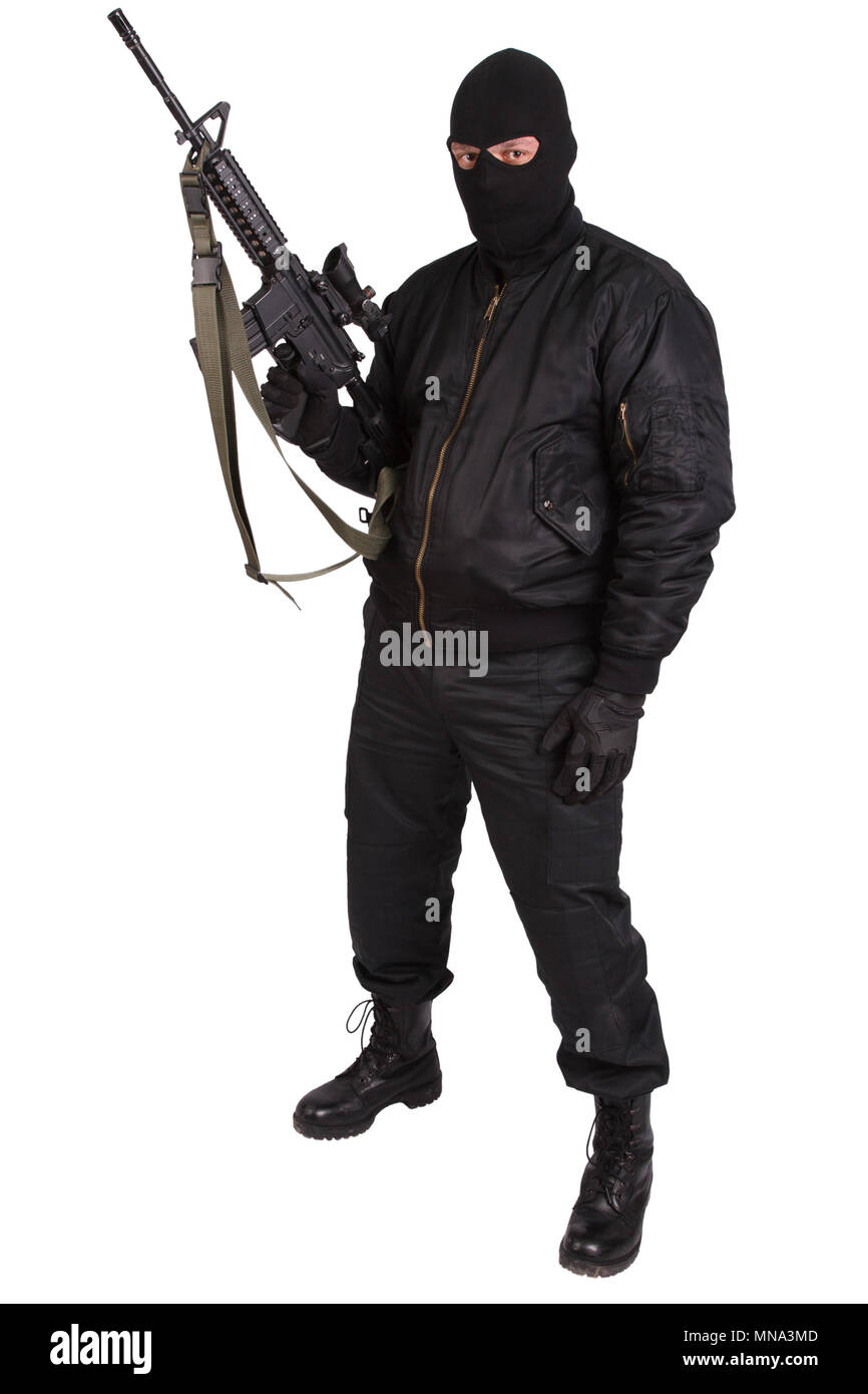 robber in black uniform and mask with m4 rifle isolated Stock Photo - Alamy