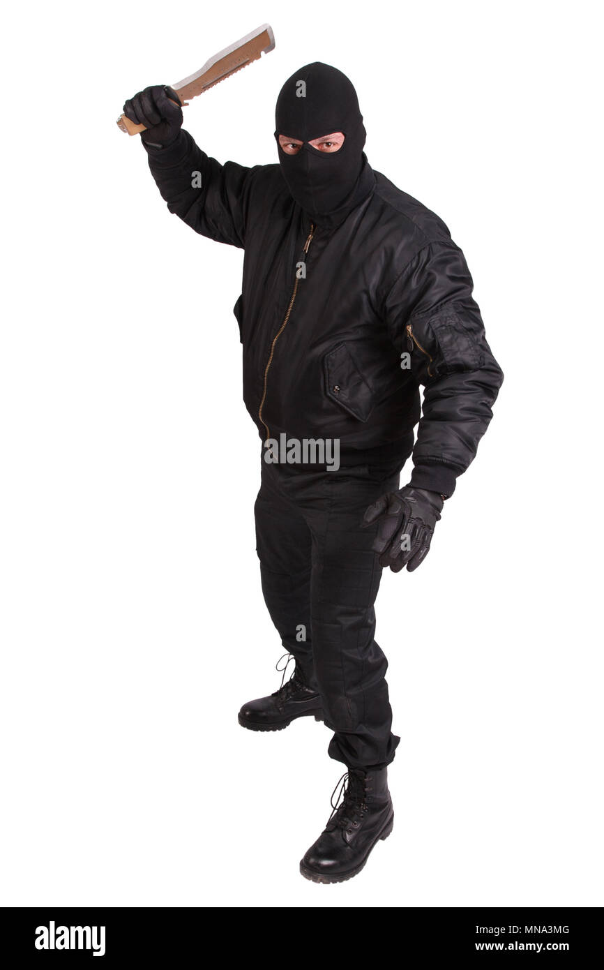 terrorist in black uniform with big knife Stock Photo - Alamy