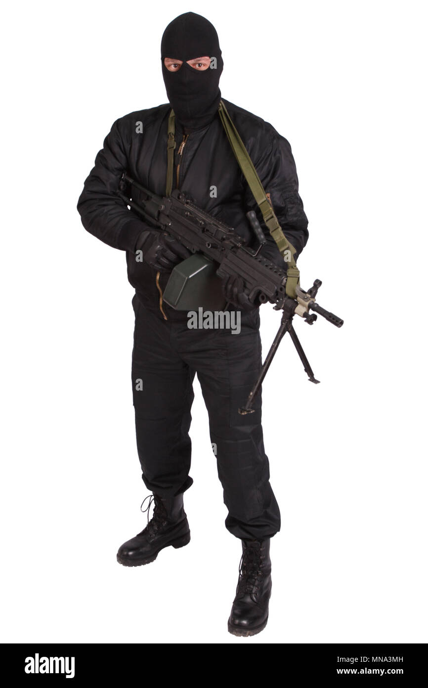 robber in black uniform and mask with machine gun Stock Photo - Alamy