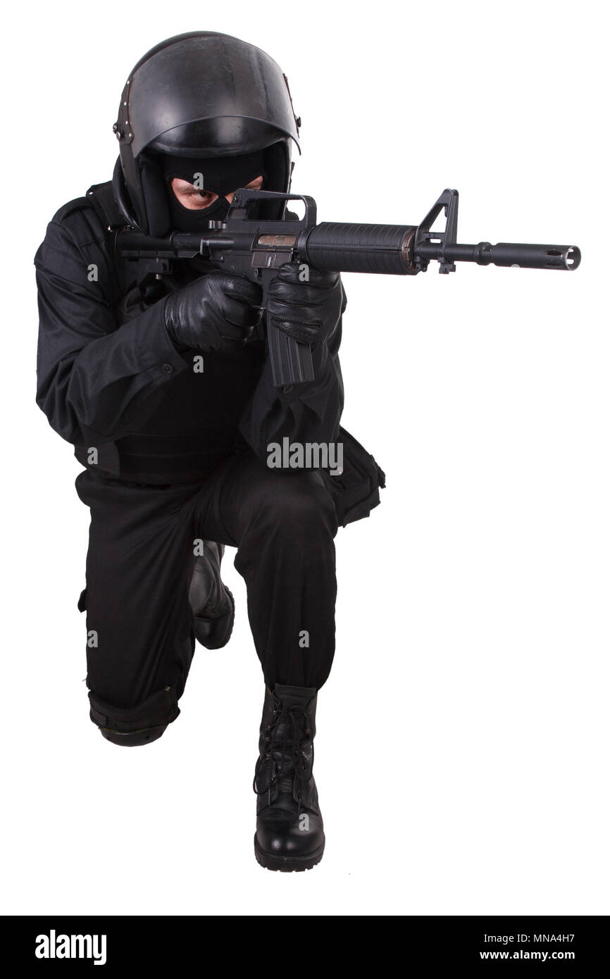 Riot police officer in black uniform isolated on white Stock Photo - Alamy