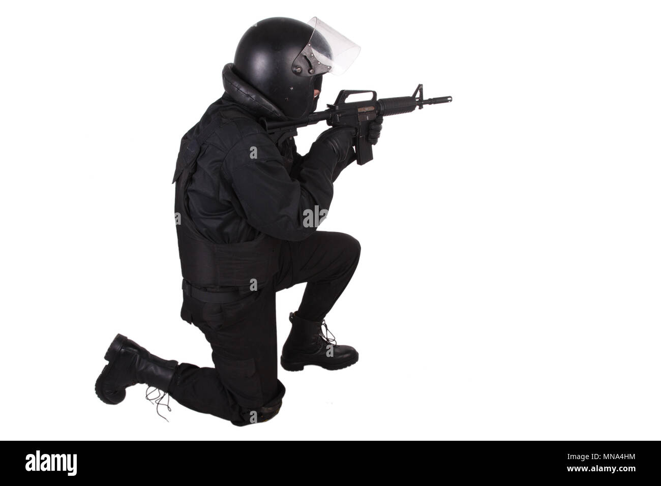 Riot police officer in black uniform isolated on white Stock Photo - Alamy