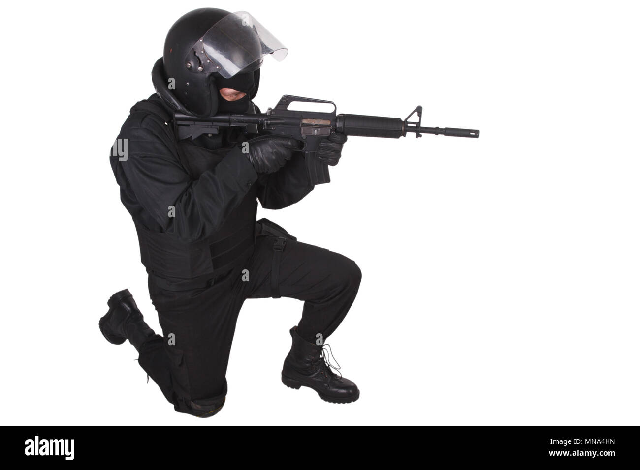 Riot police officer in black uniform isolated on white Stock Photo - Alamy