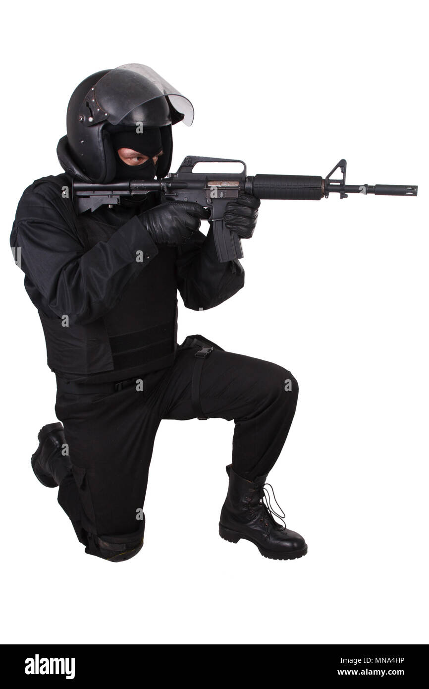 Riot police officer in black uniform isolated on white Stock Photo - Alamy