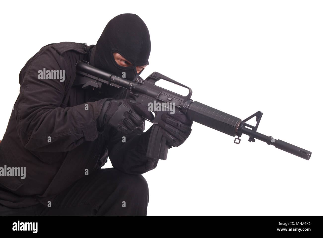 man in black uniform with M16 rifle isolated on white Stock Photo - Alamy