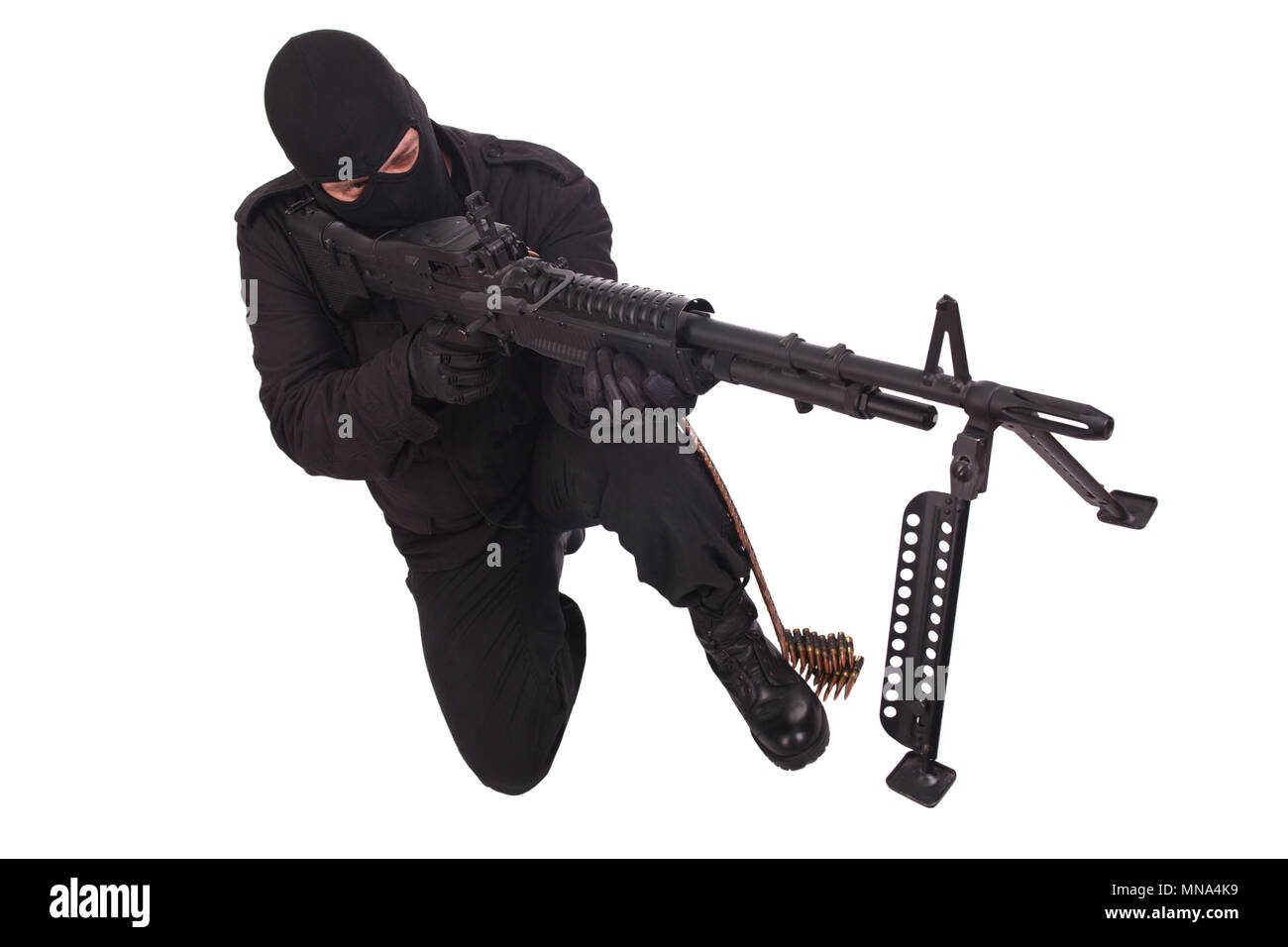 man in black uniforms with machine gun isolated on white Stock Photo ...