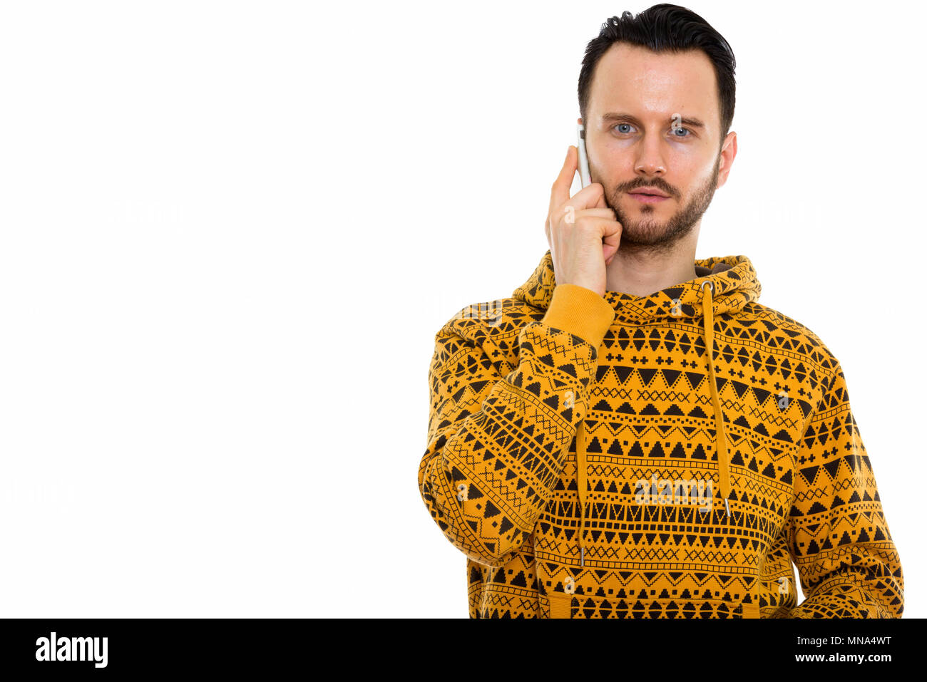 Handsome young bearded man holding hi-res stock photography and images ...