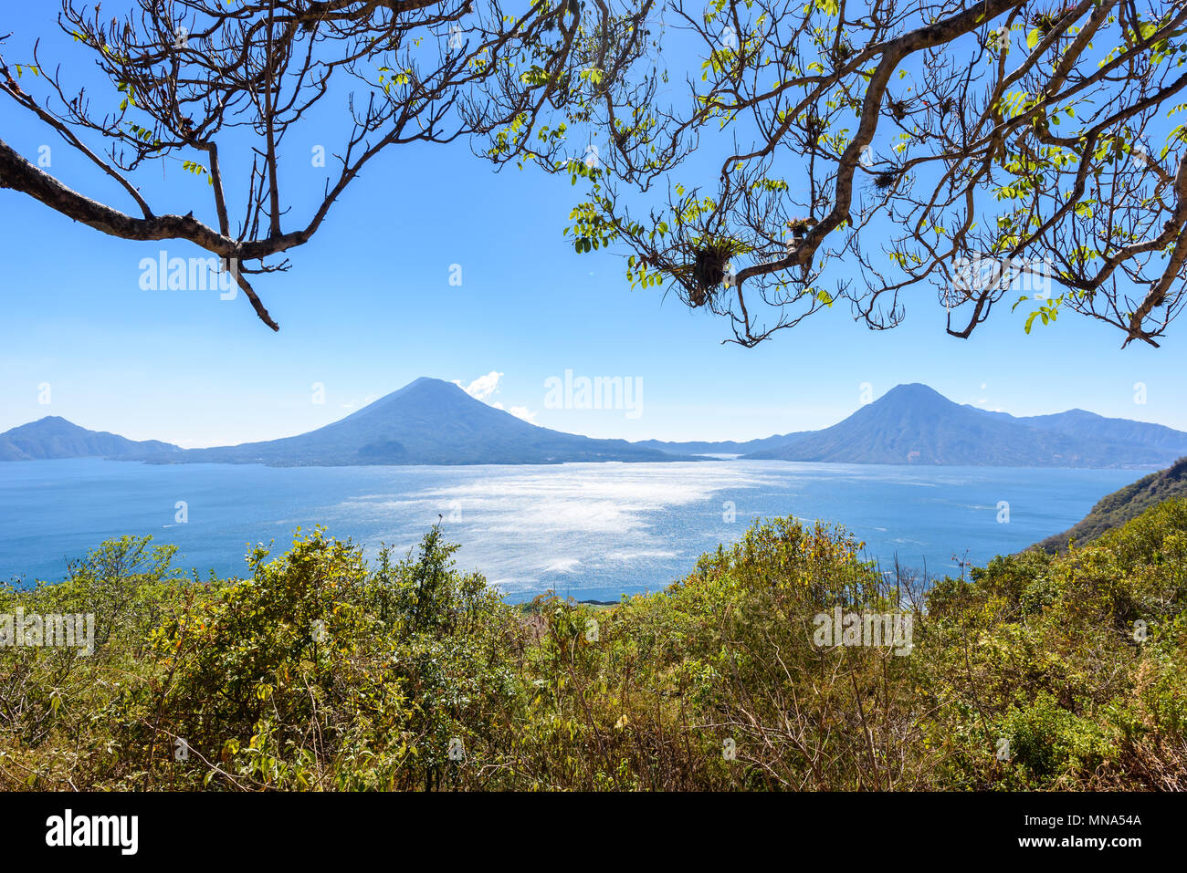 Panorama view to the lake Atitlan and volcanos - Guatemala Stock Photo ...