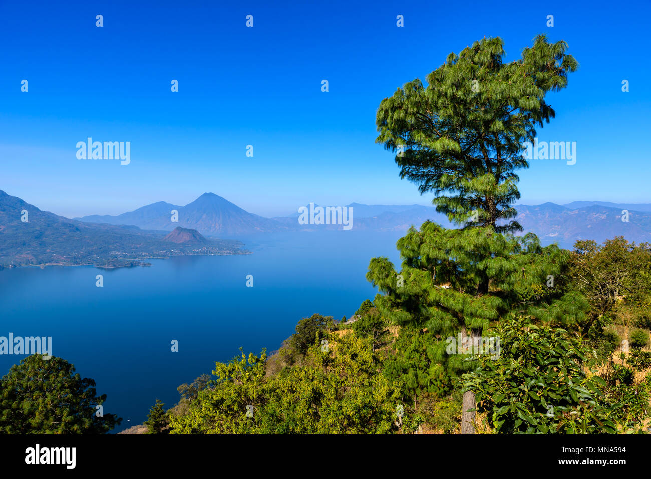 Panorama view of the lake Atitlan and volcanos in the highlands of ...