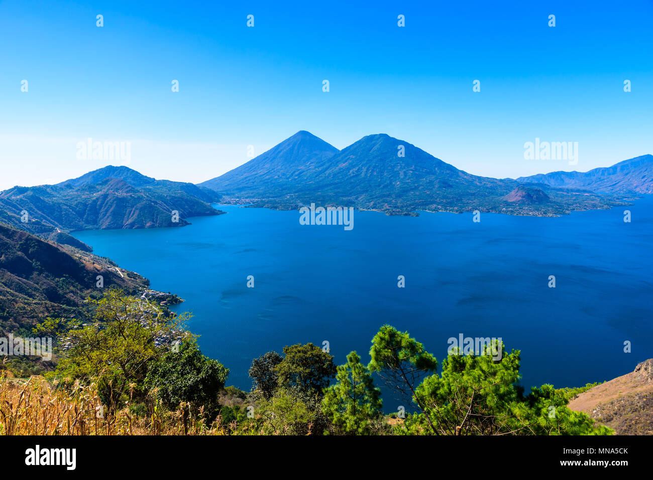 Panorama view of the lake Atitlan and volcanos in the highlands of ...