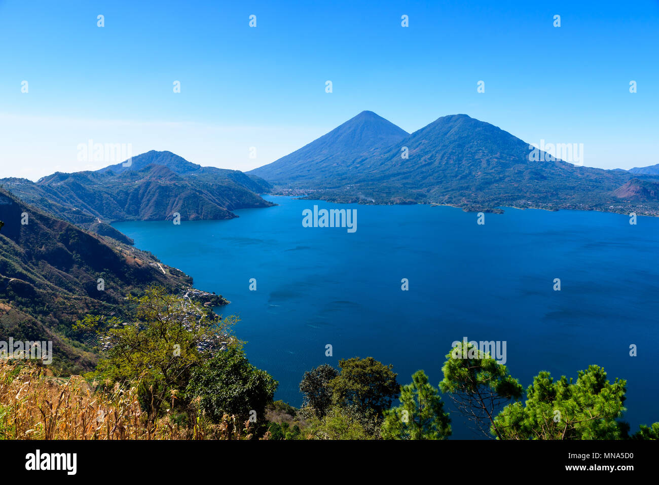 Panorama view of the lake Atitlan and volcanos in the highlands of ...