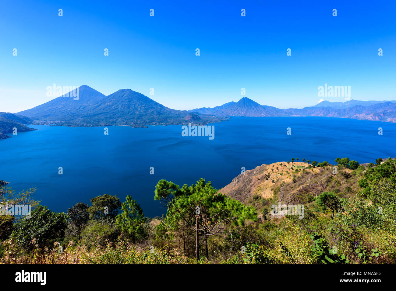 Panorama view of the lake Atitlan and volcanos in the highlands of ...