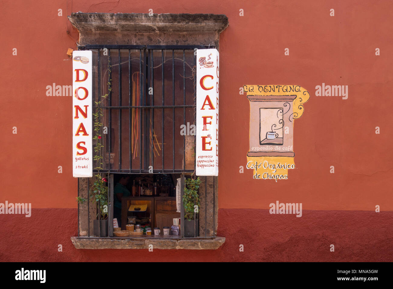 The sign and takeaway window at La Ventana Cafe in San Miguel de ...