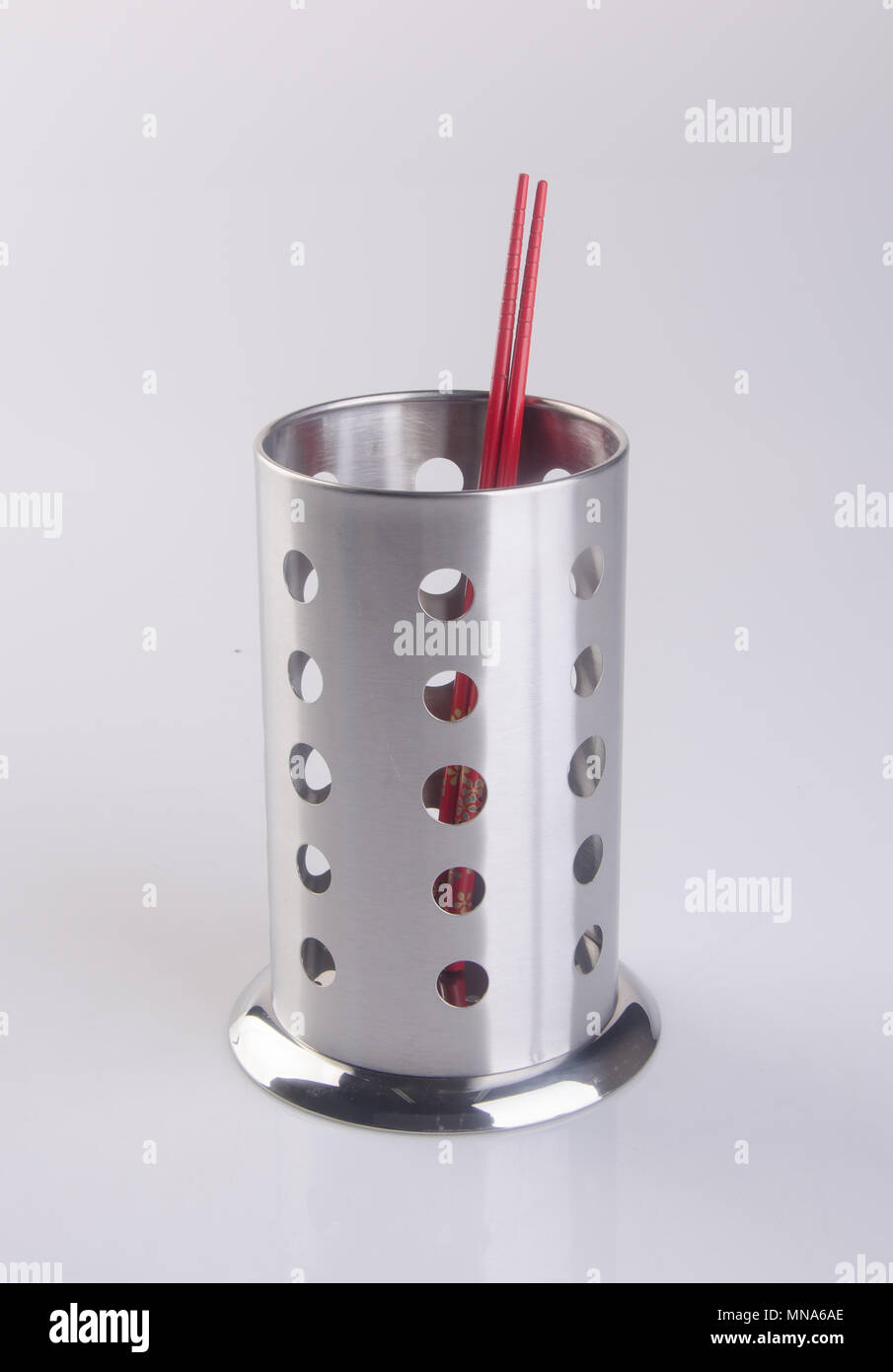 Kitchen utensils holder on the background Stock Photo - Alamy