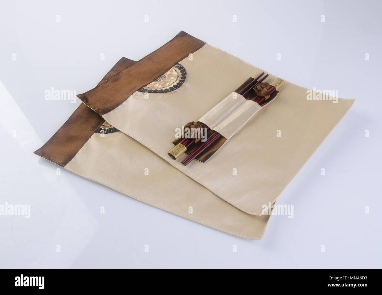table mat with chopsticks set on background Stock Photo - Alamy