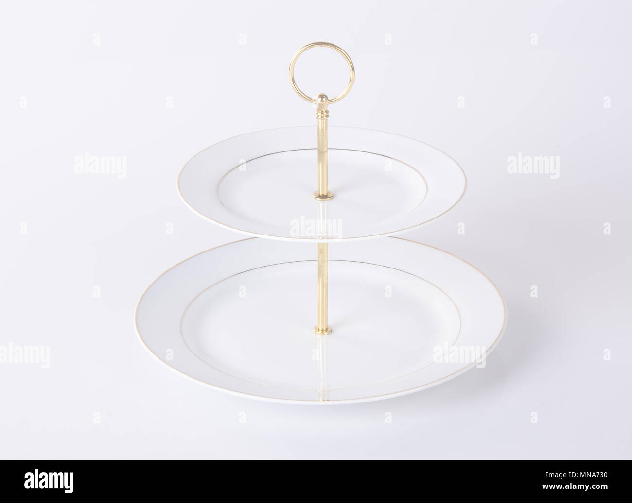 tray or two tier serving tray on a background Stock Photo - Alamy