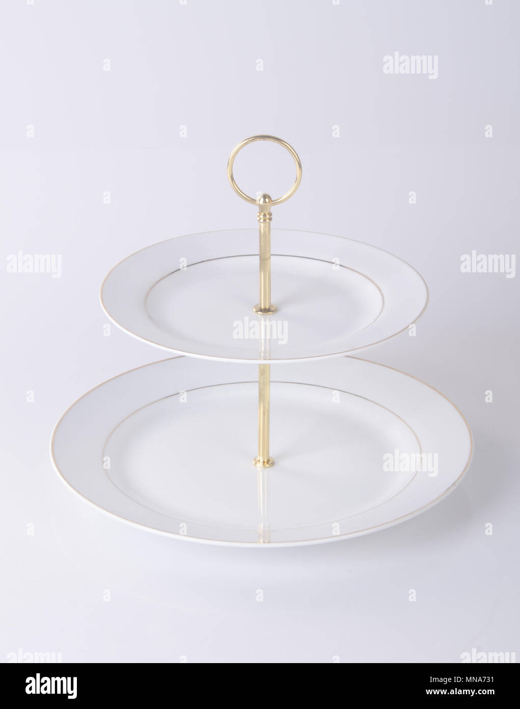 tray or two tier serving tray on a background Stock Photo - Alamy