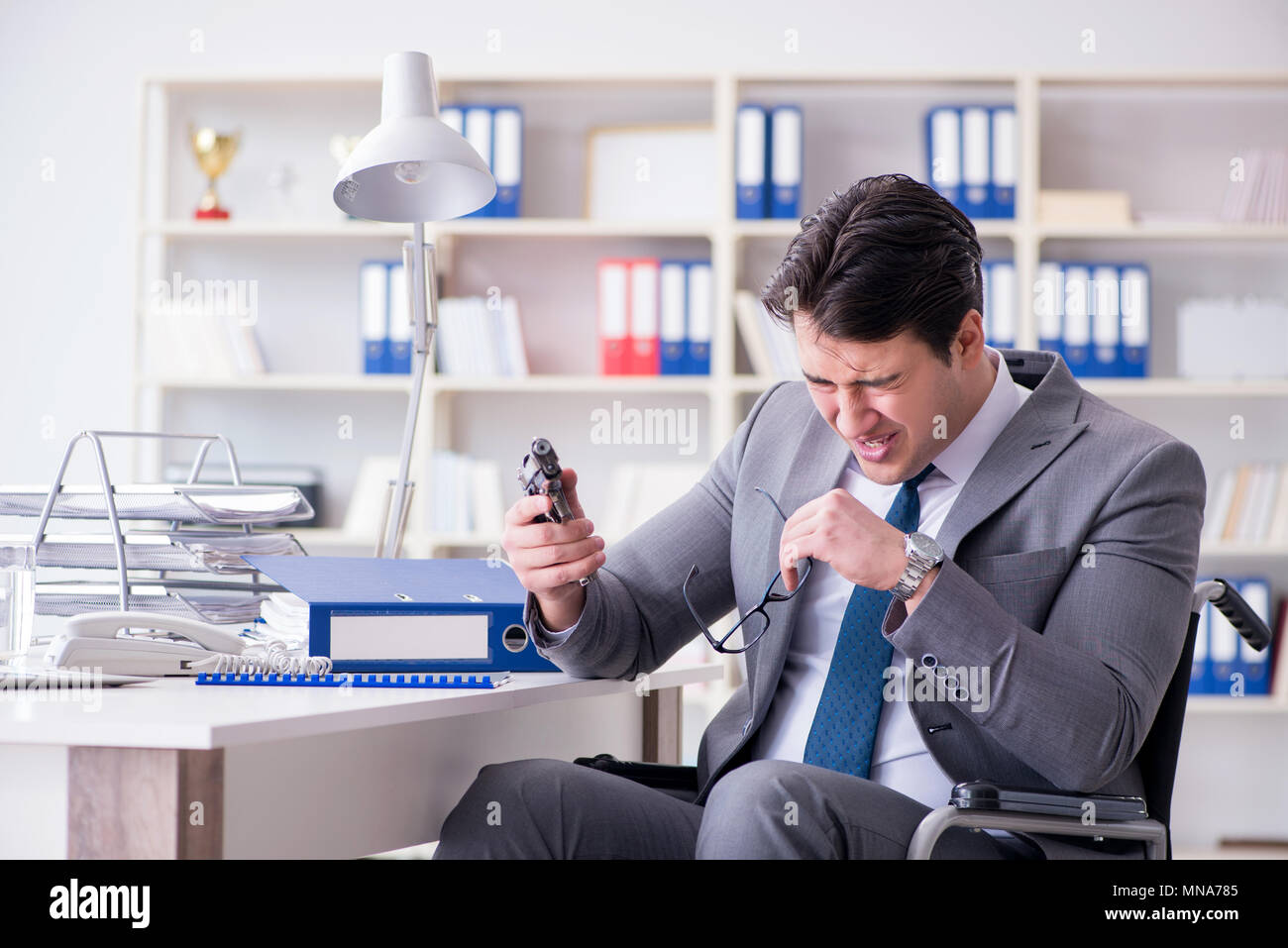 Disabled businessman on wheelchair in disability concept Stock Photo ...