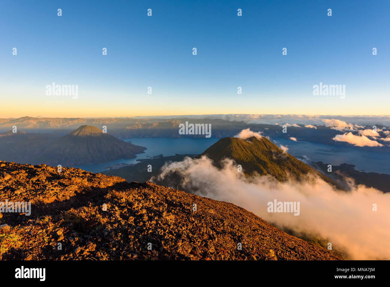 Panorama view of Lake Atitlan and volcano San Pedro and Toliman early ...