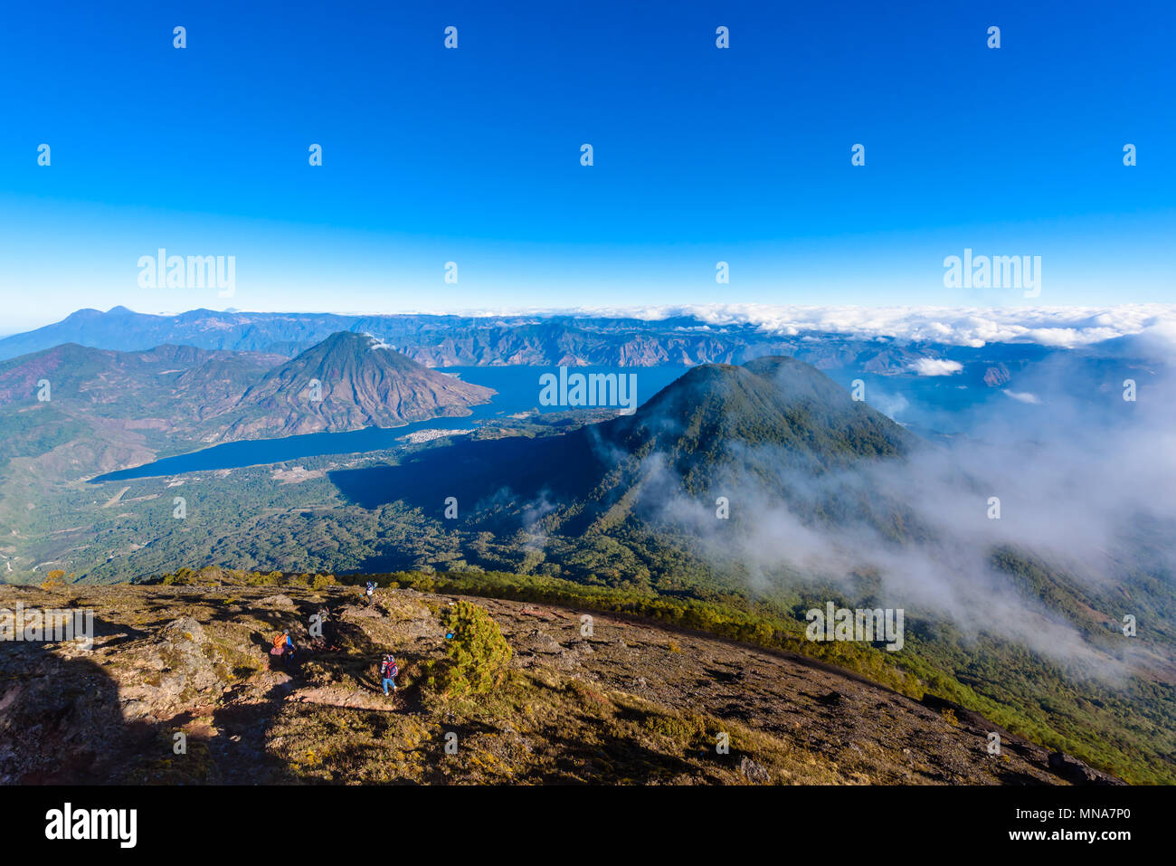 Panorama view of Lake Atitlan and volcano San Pedro and Toliman early ...