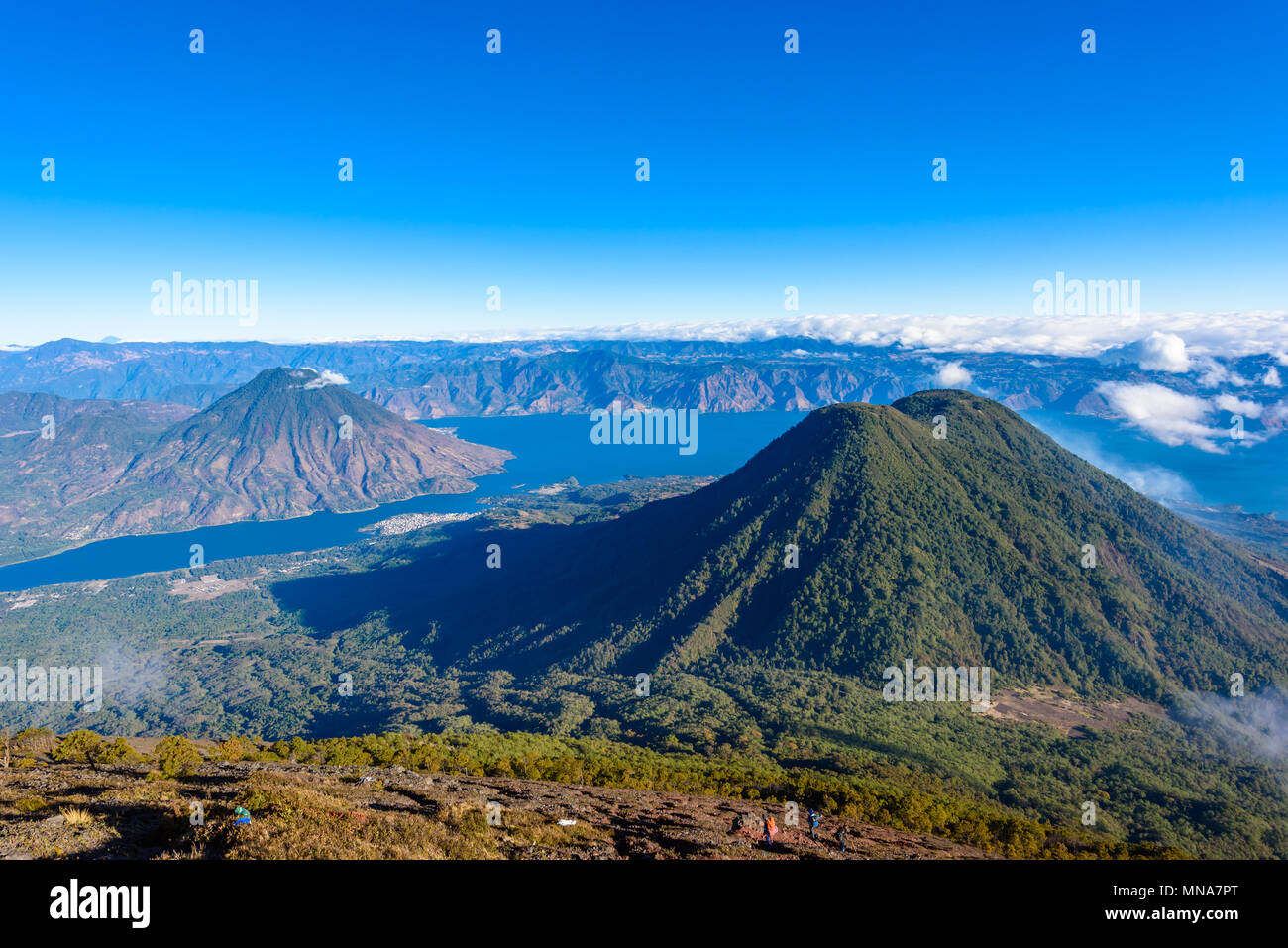 Panorama view of Lake Atitlan and volcano San Pedro and Toliman early ...