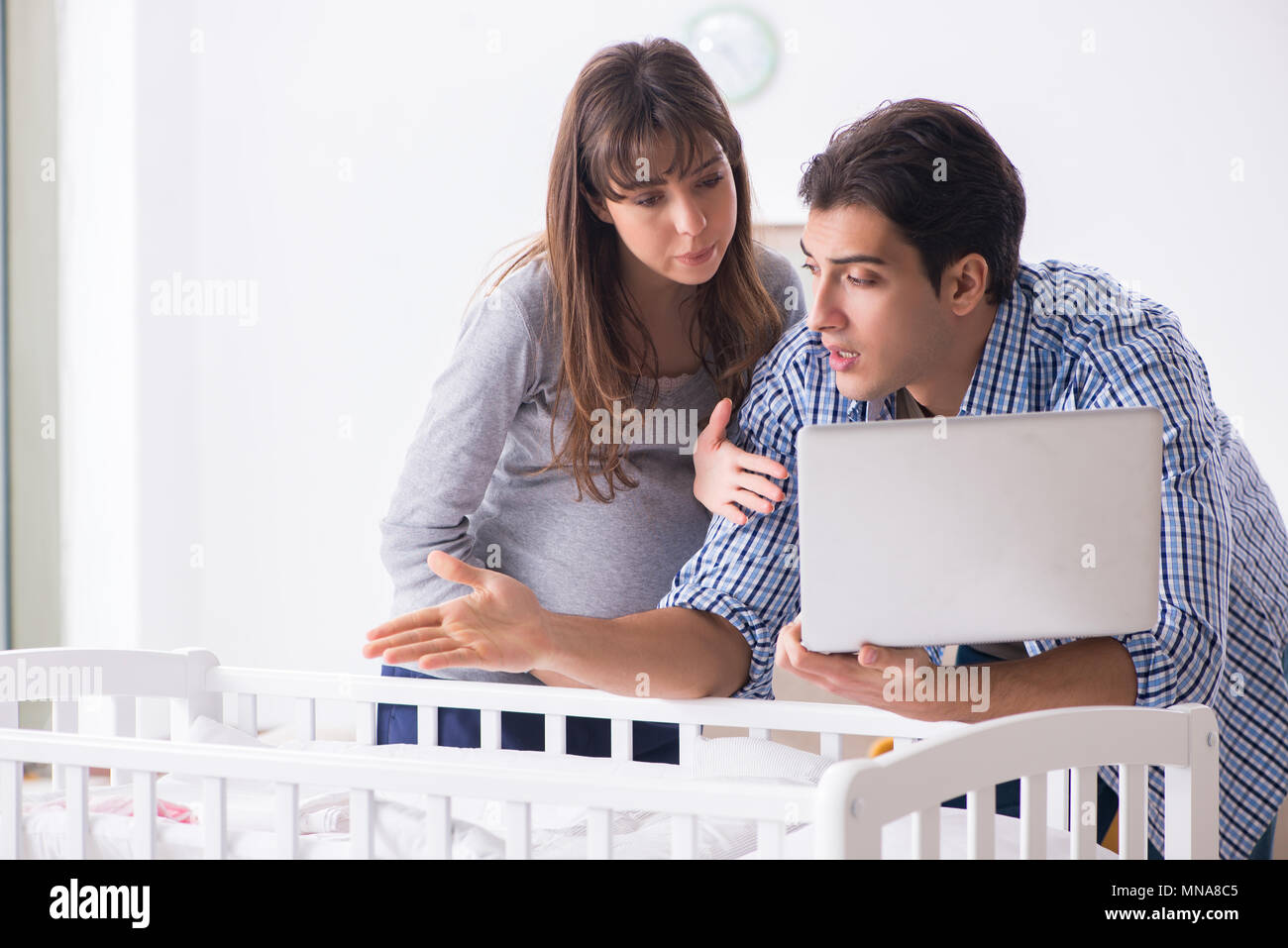 Young parents expecting their first baby Stock Photo - Alamy