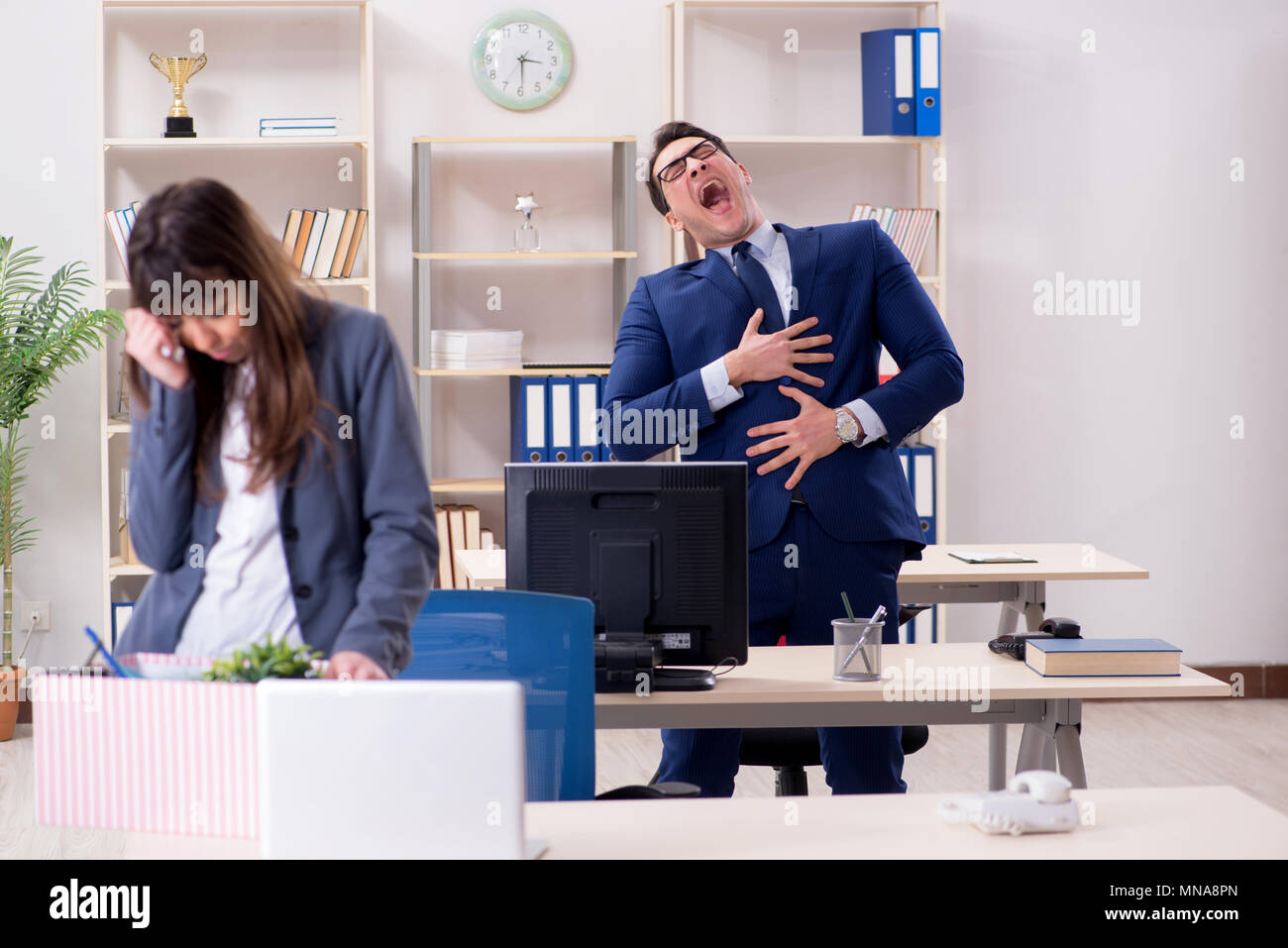 Person being fired from his work Stock Photo - Alamy