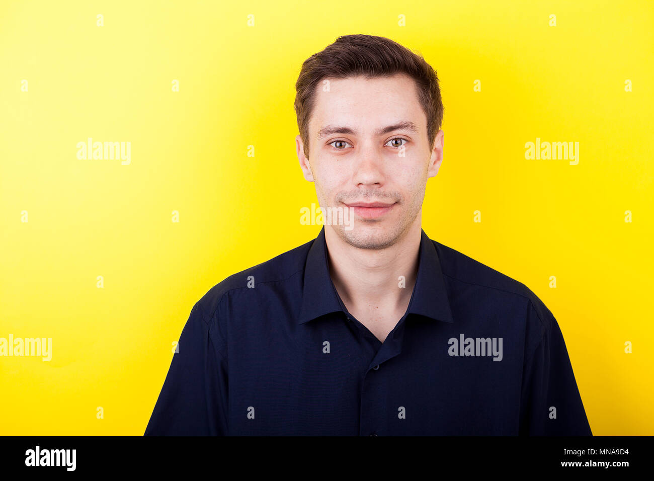 Portrait of male model in blue shirt Stock Photo - Alamy