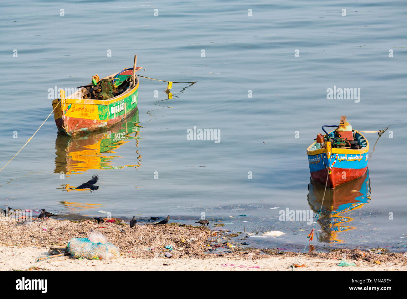 Old wood small fishing boat floating on the water, India Stock Photo ...