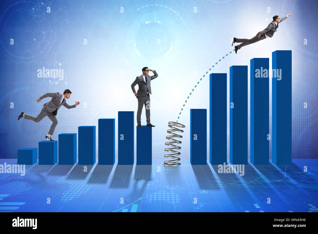 Business people jumping over bar charts Stock Photo - Alamy