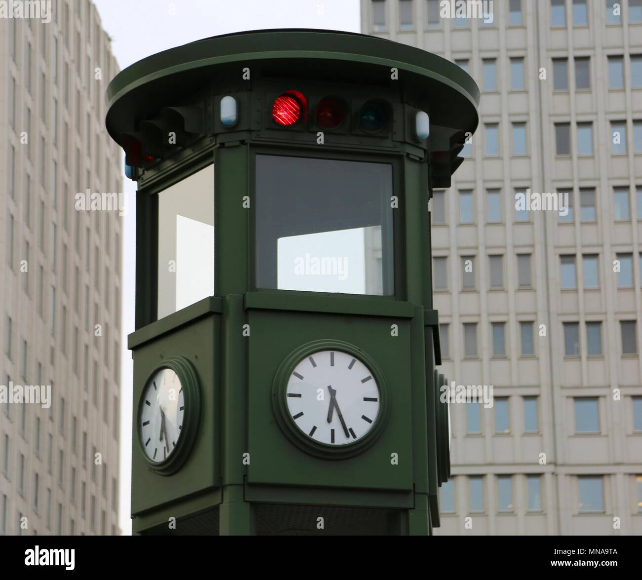 very Old historical traffic light with clock in the large East Berlin ...