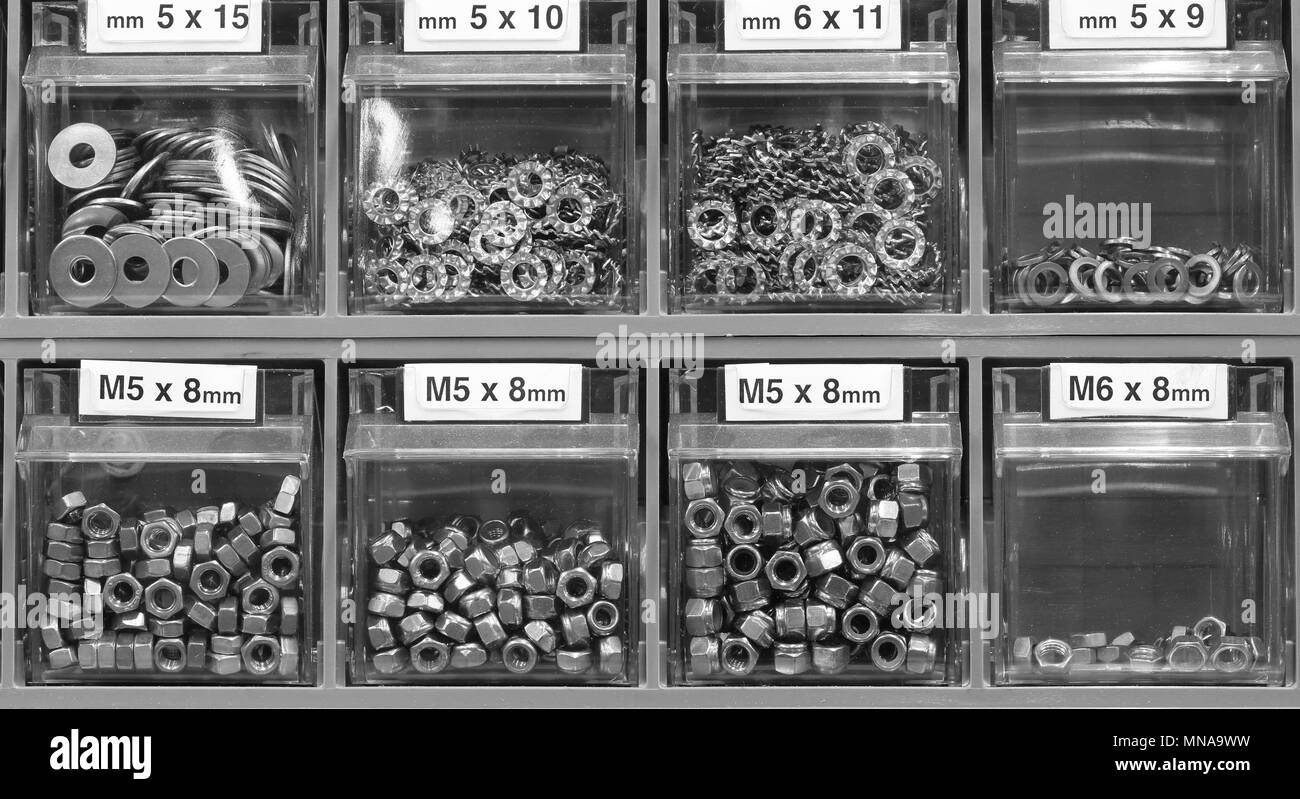 many boxes with Nuts bolts and screws in boxes in the hardware shop ...