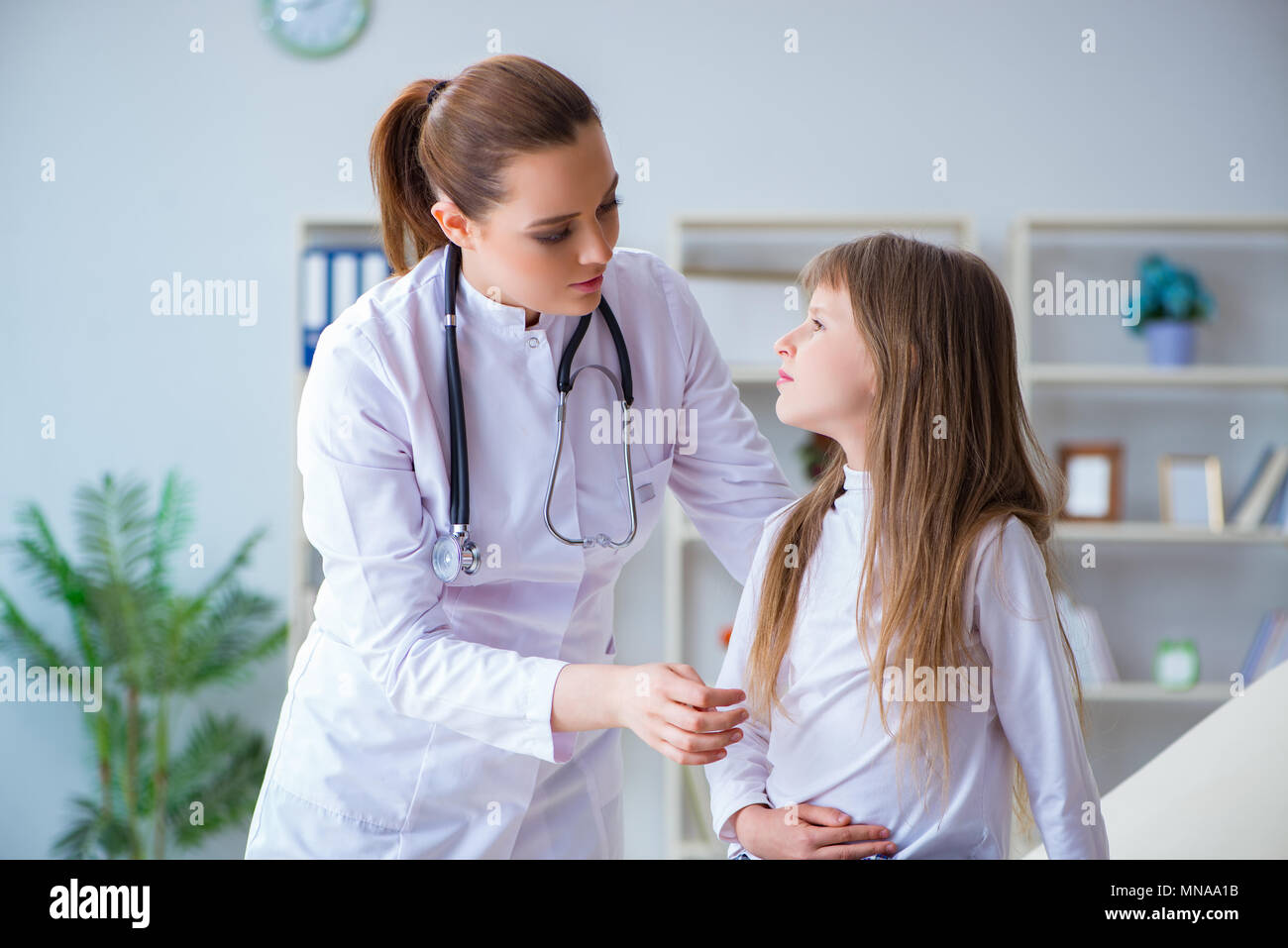 Female doctor pediatrician checking girl Stock Photo - Alamy Female doctor pediatrician checking girl Stock Photo - Alamy