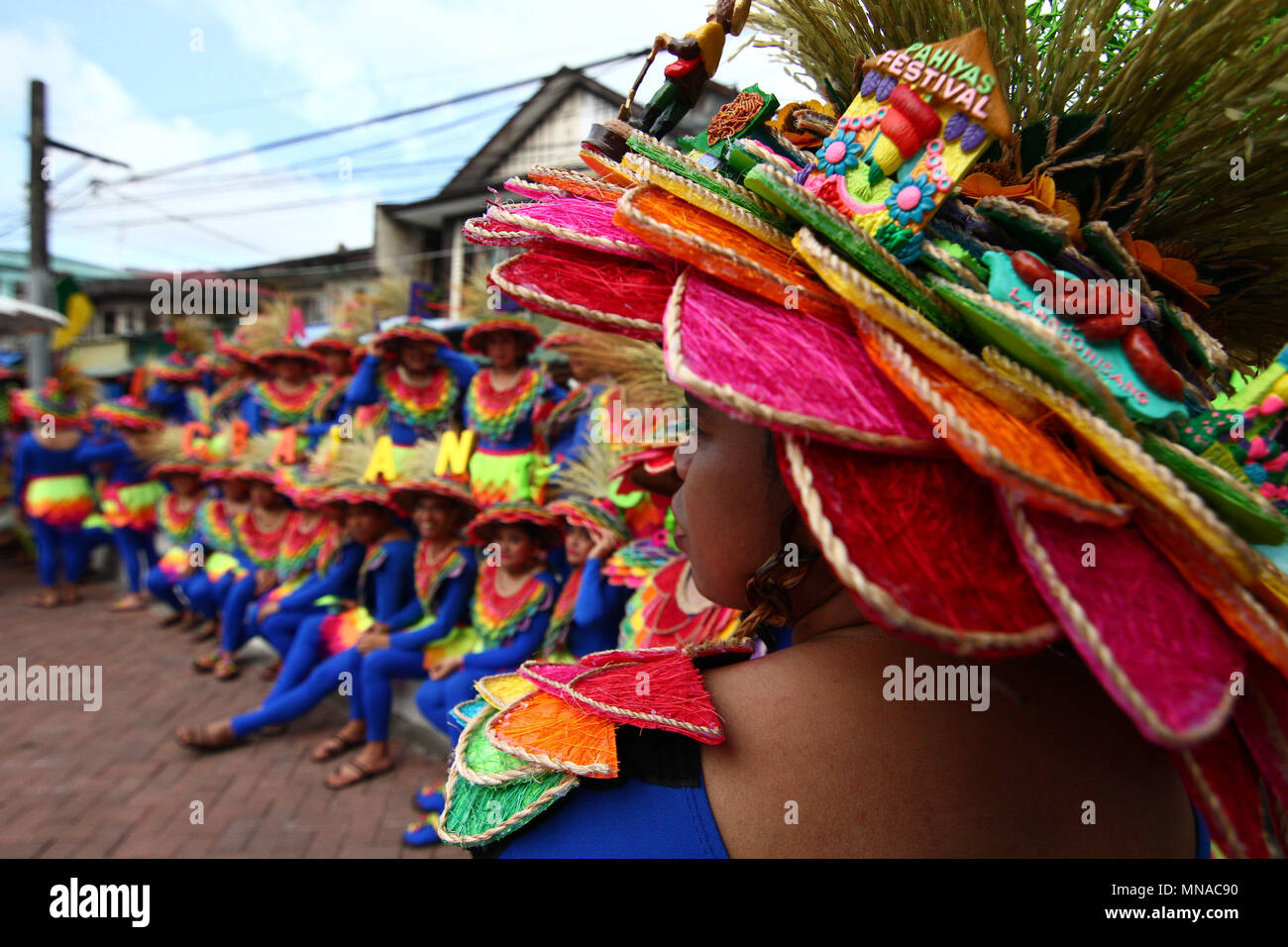 Lucban, Quezon, Philippines. 15th May 2018. Parade paricipants show off ...