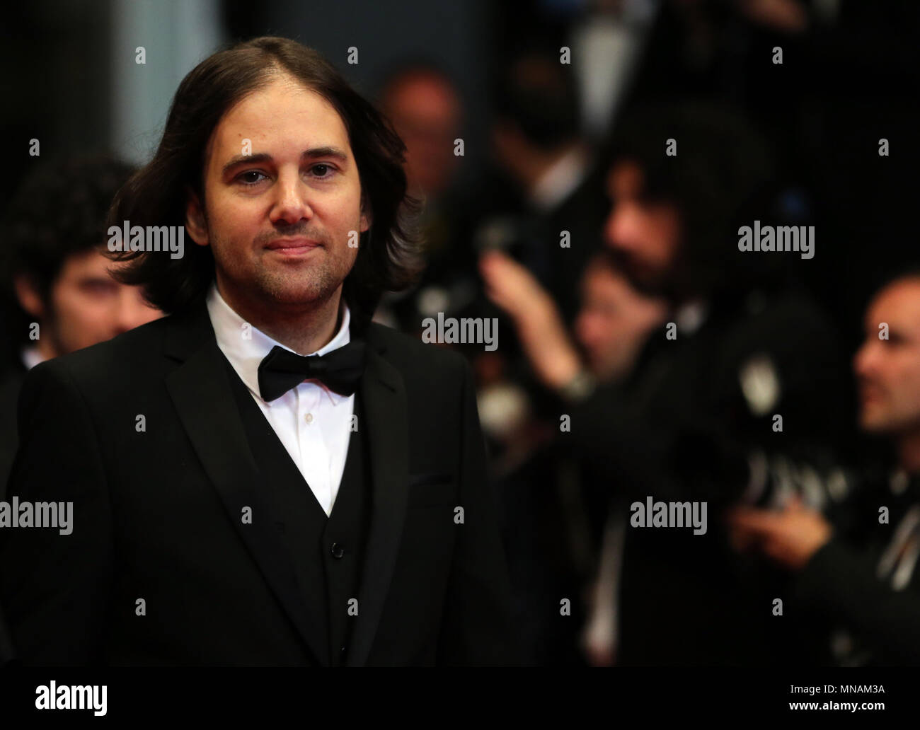 Cannes, France. 15th May, 2018. Director David Robert Mitchell poses on the red carpet during ...