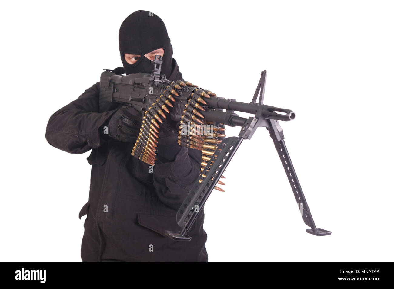 mercenary in black uniforms with machine gun Stock Photo - Alamy