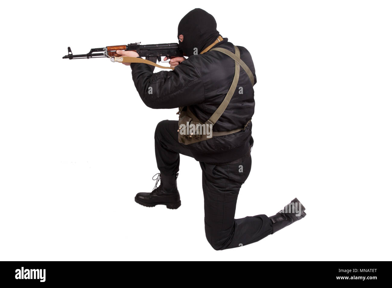 terrorist in black uniform and mask with kalashnikov isolated Stock ...