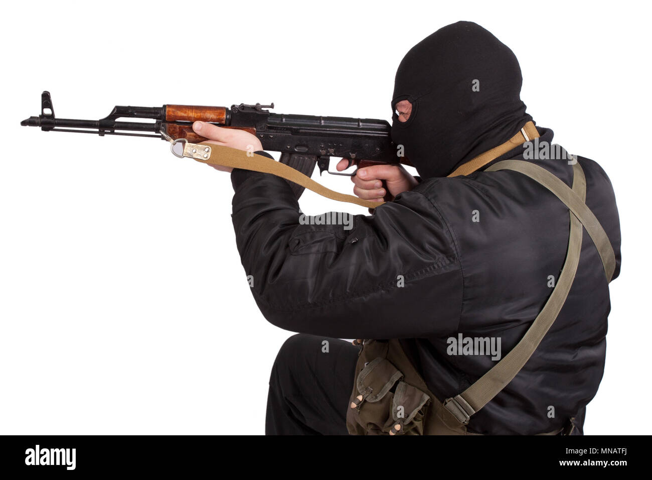 terrorist in black uniform and mask with kalashnikov isolated Stock ...