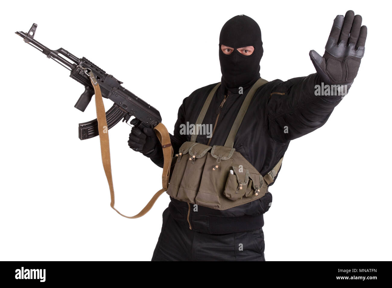 terrorist in black uniform and mask with kalashnikov isolated Stock ...
